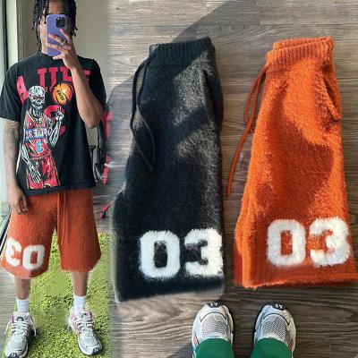 China Custom Varsity Loose Knit Shorts Pants Below Knee Bermuda Fuzzy Screen Print Knitted Streetwear Fluffy Mohair Shorts for Men for sale