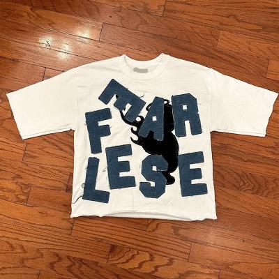 China Custom Applique Embroidery Logo Drop Shoulder Heavyweight Distressed 220 Gsm 100_ Cotton Raw Hem Cut Edge Oversized Men T Shirts for sale