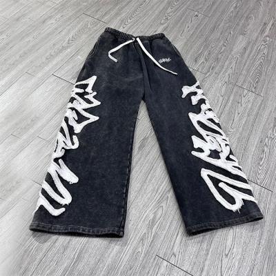 China Custom Contract Stitch Embroidery Patch Logo Hoodie Flare Baggy Loose Fit Sweatpants For Men for sale
