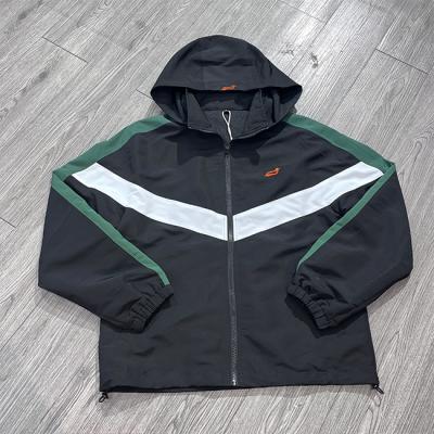 China Custom Embroidered Logo Track Nylon Jacket Windbreaker Color Contrast Patchwork Lightweight Waterproof Jacket for sale