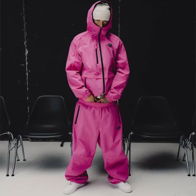China Custom Unisex Windbreaker Tracksuit Unisex Polyester Waterproof Zip up Jacket Set Nylon High Quality Luxury Tracksuit for sale