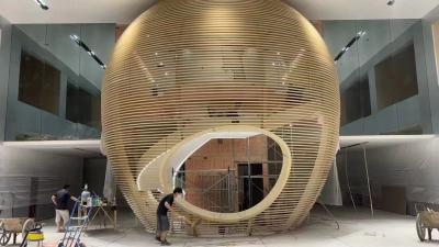 China Office Lobby 3D Radius Curved Metal Ceiling Baffle Soundproofing Woodgrain Wall Acoustic Panels for sale