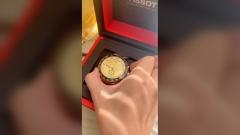 Gold chronograph watch