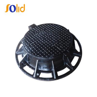 China EN124 F900 round cast iron rain drainage black bitumen painting manhole cover for sale
