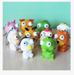Os olhos animais do squeez dos desenhos animados de borracha macios novos pisc o presente da promoção dos keyrings do keychain