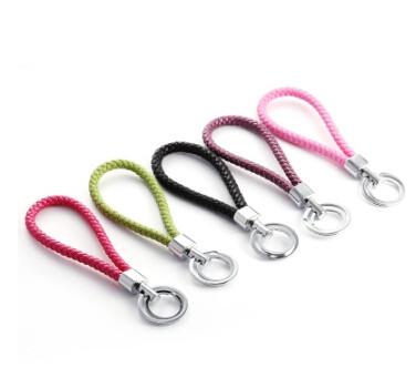 China Keyrings tecidos do keychain do metal do plutônio do produto do presente couro criativo novo à venda