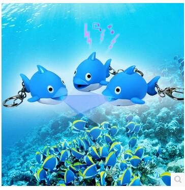 China O golfinho animal dos desenhos animados criativos novos do produto do presente conduziu keyrings claros do keychain com som à venda