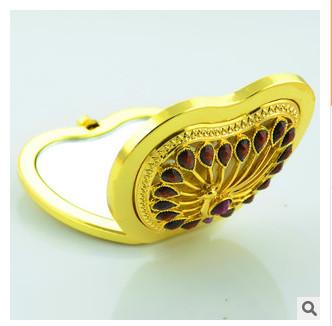 China O presente criativo novo da promoção customed o espelho luxuoso da composição do bolso da maçã do cobre do logotipo do diamante à venda
