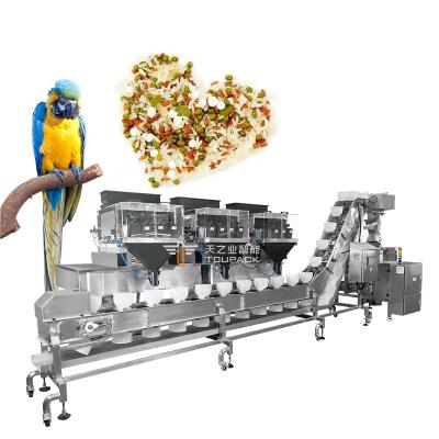 China 1kg Parrot Food Pet Food VFFS Nuts Granule Freeze Dried Fruit Packaging Machine For Dried Fruits for sale
