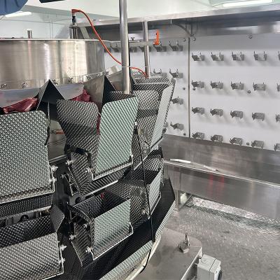 Cina Confezionatrice automatica per pesare e confezionare completamente pesce surgelato, pollo, tacchino, manzo, polpette - Confezionatrice per carne per costine in vendita