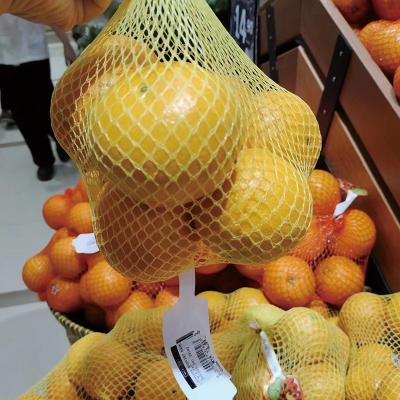 China Vollautomatischer Netzbeutel-Verpackungsmaschine mit Clip-Funktion für Kartoffeln, Zwiebeln, Knoblauch, Orangen, Gemüse-Netzbeutel-Verpackungsmaschine zu verkaufen