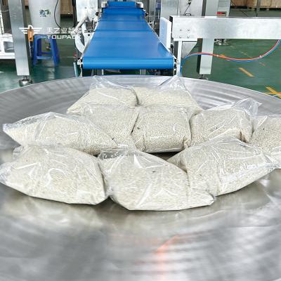 China Máquina automática de envasado de hojuelas de maíz 220V 30-60BPM en venta