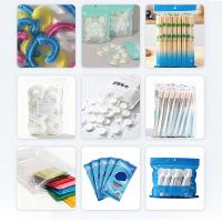 China Plastic Fork Automatic Packing Machine Shower Cap Packaging Machine Multihead Weigher Packaging System for sale