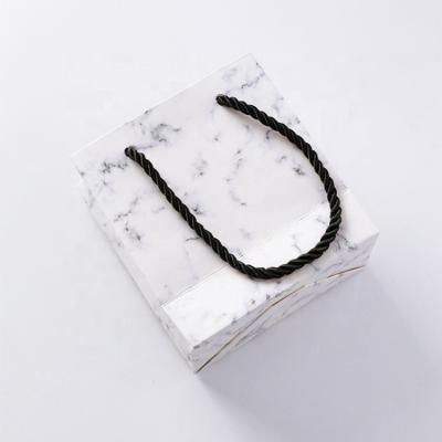 Cina Il braccialetto dell'orecchino del pendente suona il materiale di carta modellato marmo d'imballaggio del contenitore di collana in vendita