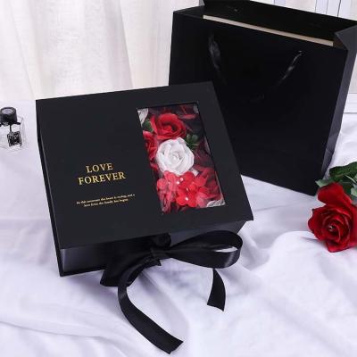 Cina Scatola d'imballaggio delle decorazioni del nuovo anno di San Valentino del libro del regalo della finestra a forma di della borsa in vendita