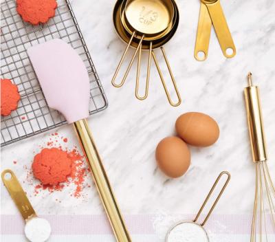Cina Oro & insiemi rosa dell'utensile della cucina del silicone, supporto dell'utensile dell'oro in vendita