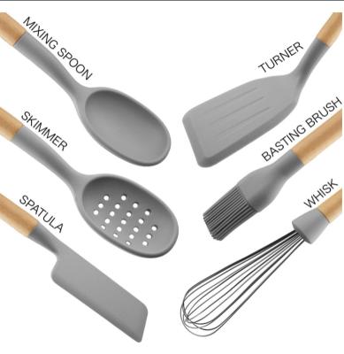 Cina L'utensile della cucina del silicone del bastone di 6 pezzi non mette con le maniglie di legno per cucinare in vendita