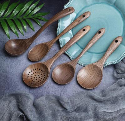 Cina CU di legno non tossico monolitico della noce degli utensili da cucina certificato in vendita