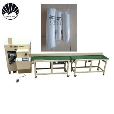 Cina Animale domestico Mat Coiling And Wrapping Machine del piumino del cuscino del piumino in vendita