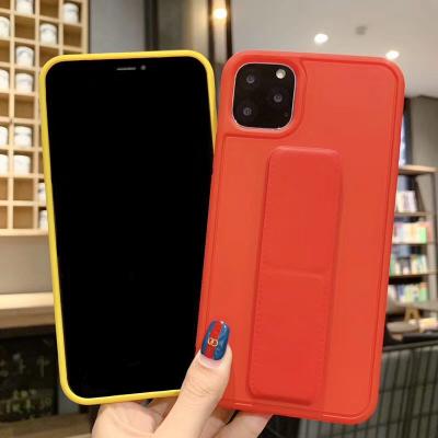 Cina 2 in 1 supporto materiale antiurto della presa del dito della cassa TPU del telefono di colore di Candy in vendita