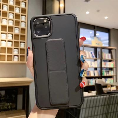 Cina 2 in 1 supporto materiale antiurto della presa del dito della cassa TPU del telefono di colore di Candy in vendita