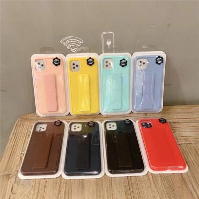 Cina 2 in 1 supporto materiale antiurto della presa del dito della cassa TPU del telefono di colore di Candy in vendita