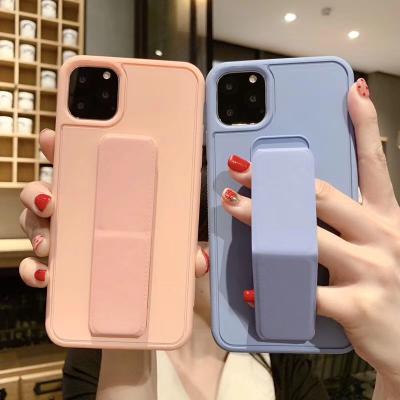 Cina 2 in 1 supporto materiale antiurto della presa del dito della cassa TPU del telefono di colore di Candy in vendita