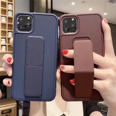 Cina 2 in 1 supporto materiale antiurto della presa del dito della cassa TPU del telefono di colore di Candy in vendita