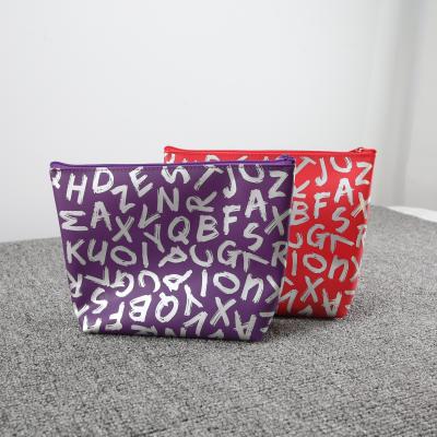 China PVC Personalised Makeup Bag Lightweight Eco Friendly Plastic Zippered Cosmetic Storage Bag for sale