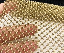 China The popular cascade coil metal drapery and mesh curtain serves as a metal partition for sale