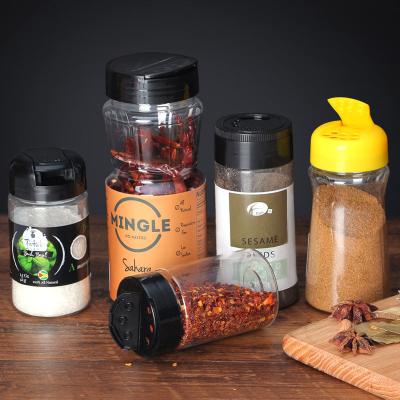 China New Cheap 300Ml Container Kitchen Round Plastic Seasoning Spices Jars And Shaker Spice Bottle With Customized Lid for sale