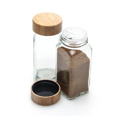China Kitchen Glass Seasoning Jar Oil Salt Container Wholesale Chili Pepper Shaker With Bamboo Lid 120ml for sale