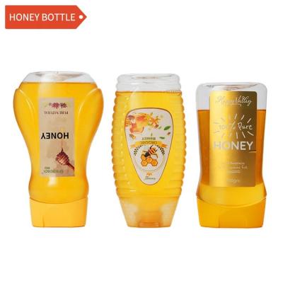 China gracepack pet Inverted silicone valve honey squeeze bottle plastic , plastic honey bottle 500ml, honey bottle for sale