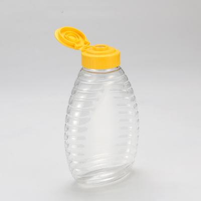 China Hot sale proper price Clear empty bee honey /tomato sauce/ketchup/jam/jelly Condiment PET honey squeeze bottle for sale