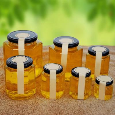 China 2022 Popular sales honey spoon hexagon honey jar, storage bottles jars for sale
