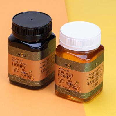 China 2022 Square food container honey plastic jar transparent storage bottle with lid for sale