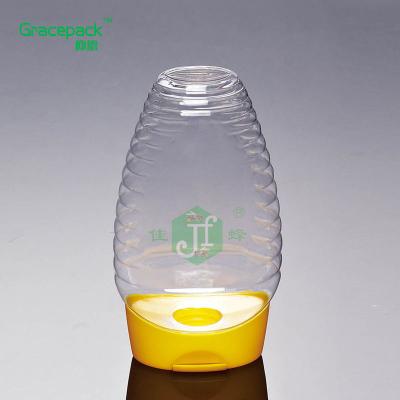 China 2022 honey bottle factory direct supply plastic honey bottle custom logo shape plastic ketchup honey bottle for sale