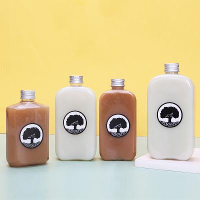 China Hot Products Milk Tea Machi Online Celebrity Milk Tea Flat Square Disposable Pet Plastic Beverage Bottle Oil Orange Bottle for sale