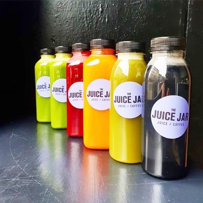 China Factory Sell Juice 8 Oz PET Plastic Disposable Milk Bulk Beverage Juice Bottles With Caps for sale