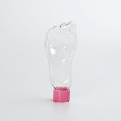 China 2019 Popular sales 50ml PET foot shape clear cute juice bottles beverage bottle, plastic candy bottle for sale