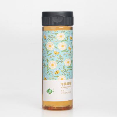 China Transparent Plastic Drink Bottle Transparent Round Shape Beverage Honey Bottle 360ml for sale