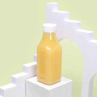 China Custom PET 400ml transparent square PET beverage bottle food grade 13oz plastic bottle for sale