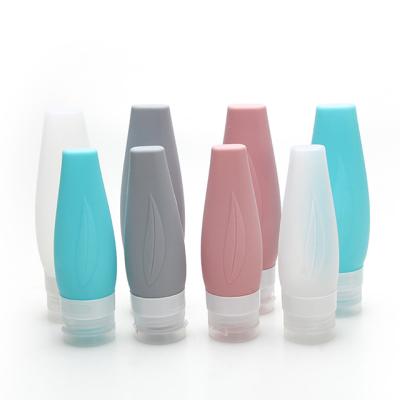 China 2022 Reusable Silicone Squeezable Travel Fit Lotion Bottle Shampoo Cream Dispensing Bottle 60ml 90ml for sale