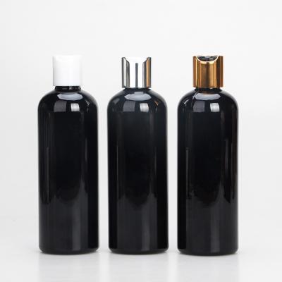 China 300ml oz black body lotion bottle cosmo round PCR RPET Dispensing bottle with Disc Top Cap, plastic shampoo bottle for sale