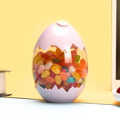 China Wholesale Creative Eggshell Shape Cartoon Toy Bottle Food Grade Transparent Plastic Biscuit Candy Bottle 400ml for sale