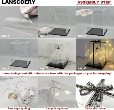 中国 Collectiblesのゆとりのライトおよびリボンが付いているアクリルの陳列ケース 販売のため