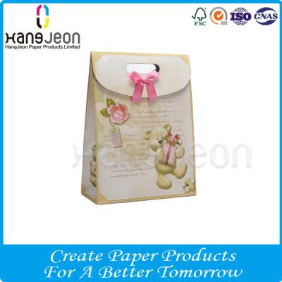 China Customized Fashion Cosmetic Diecut Hole Shopping Paper Bag with Knot Ball for sale