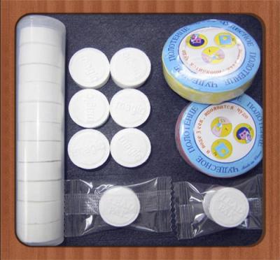 China 10pcs/tube packing 100% mesh spunlace white nonwoven fabric compressed towel round shape for sale