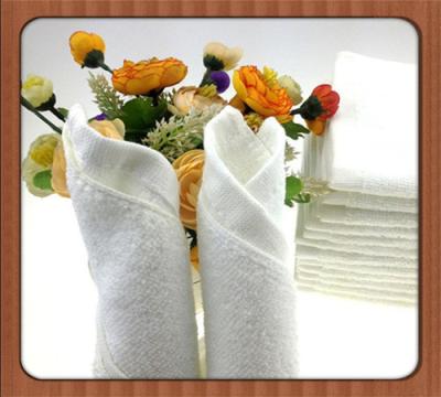 China Discount cheap cotton terry solid bath compressed orangic Egyptian hotel towel for sale