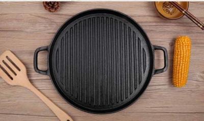 China Thick cast iron uncoated circular griddle commercial barbecue grill outdoor picnic cooker for sale